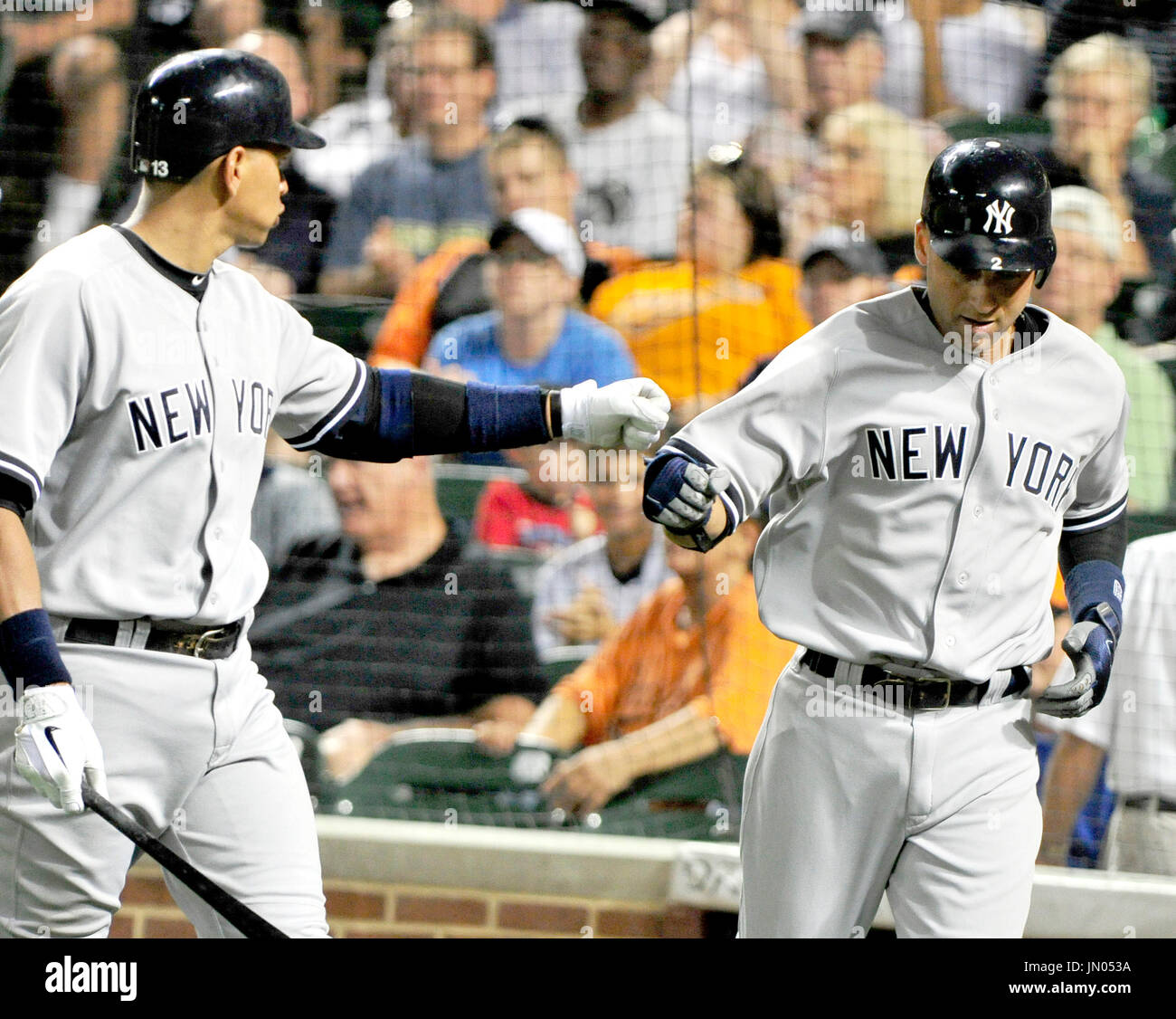 New York Yankees third baseman Alex Rodriguez (13), left, and ...
