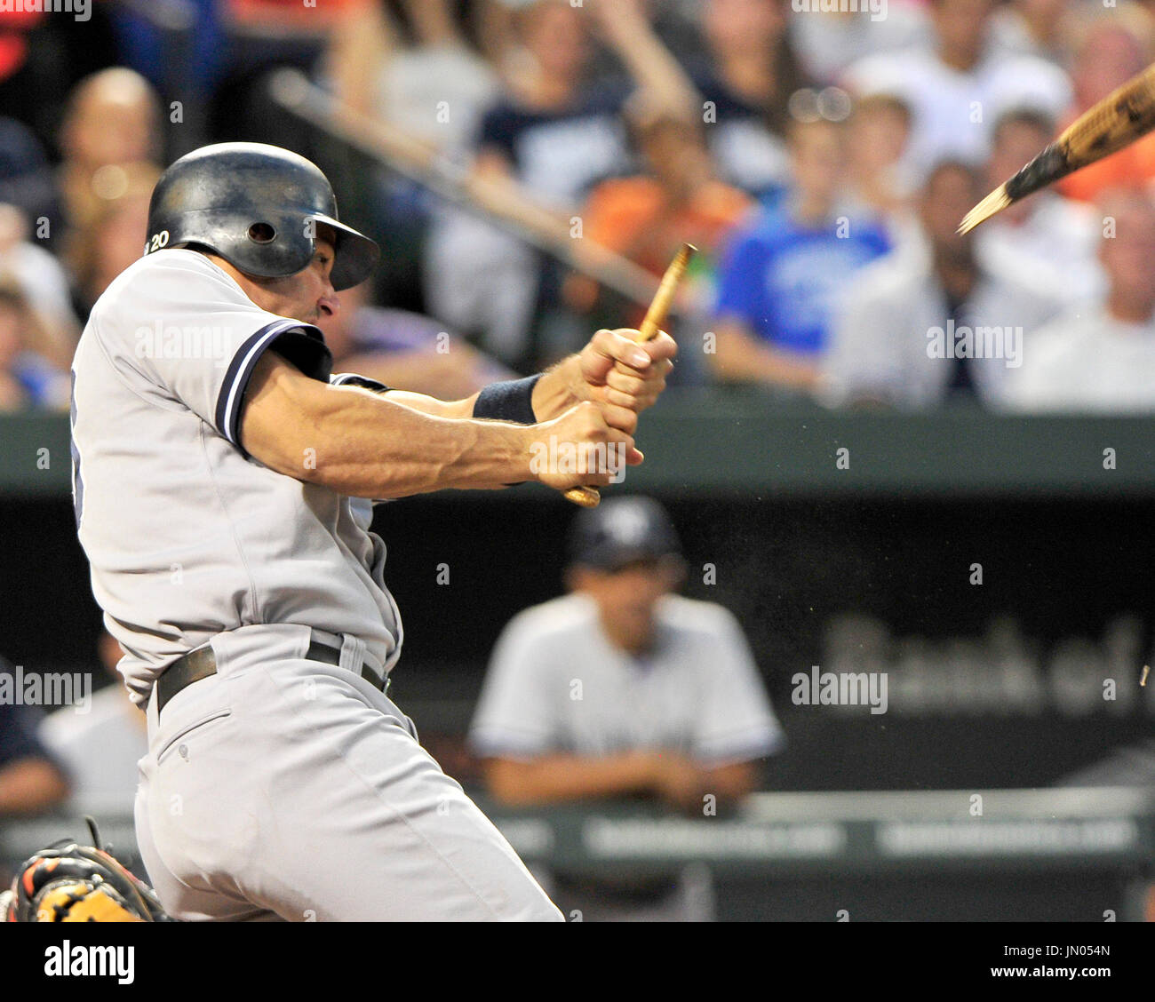 New York Yankees designated hitter Jorge Posada (20) breaks his bat in ...