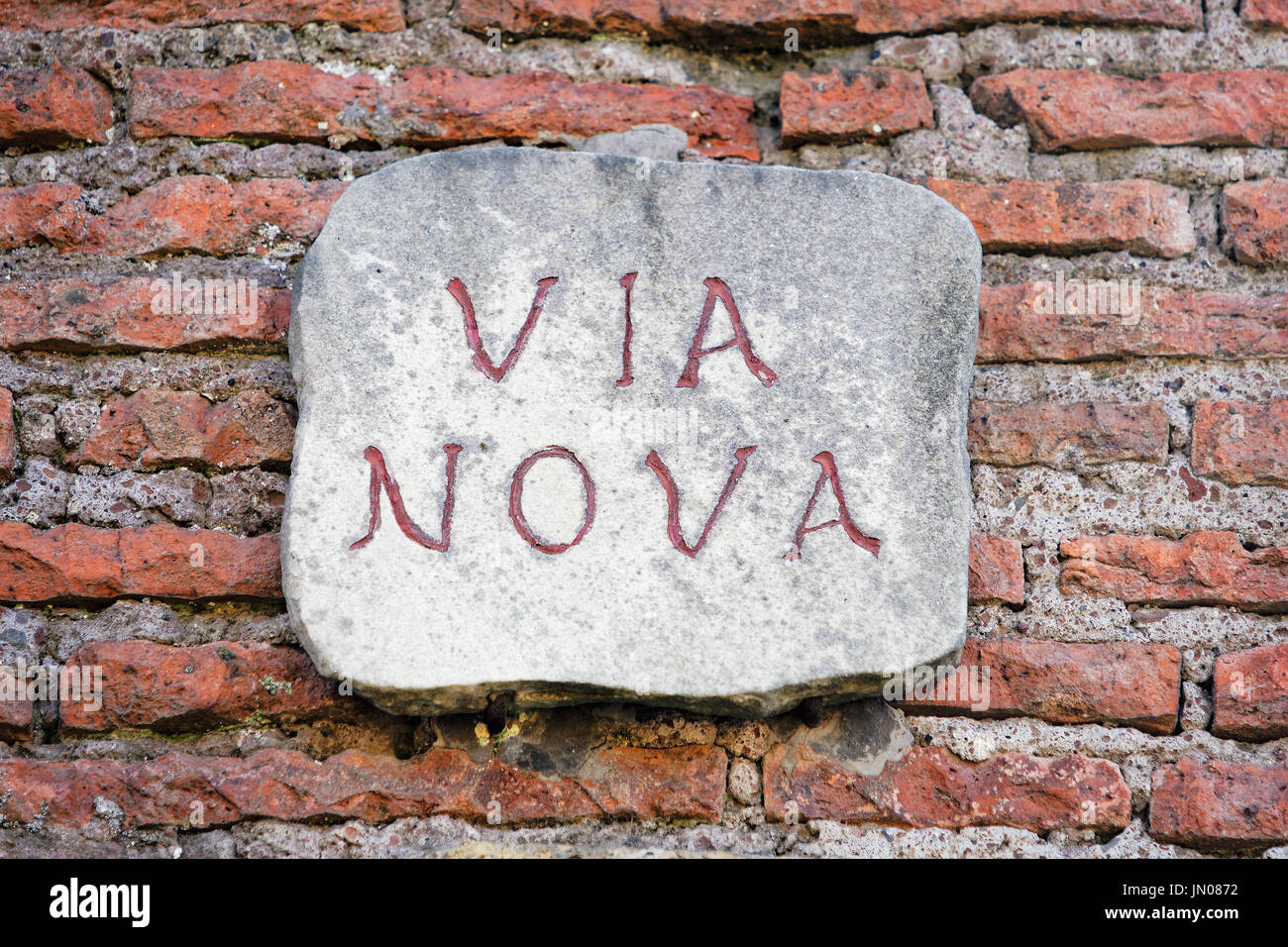 Via Nova sign on the brick wall in Rome, Italy Stock Photo - Alamy