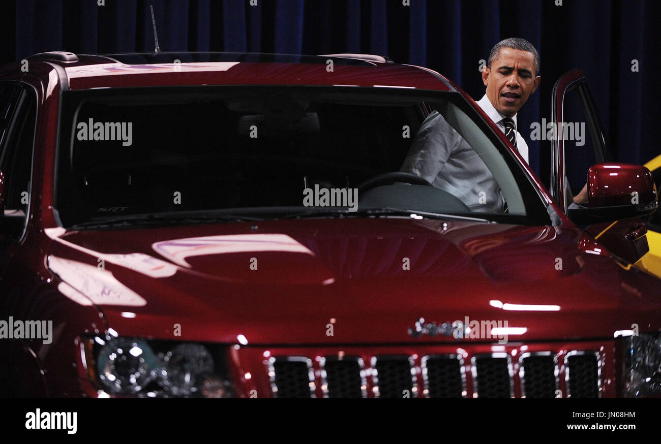 United States President Barack Obama looks at a Jeep during a visit to ...