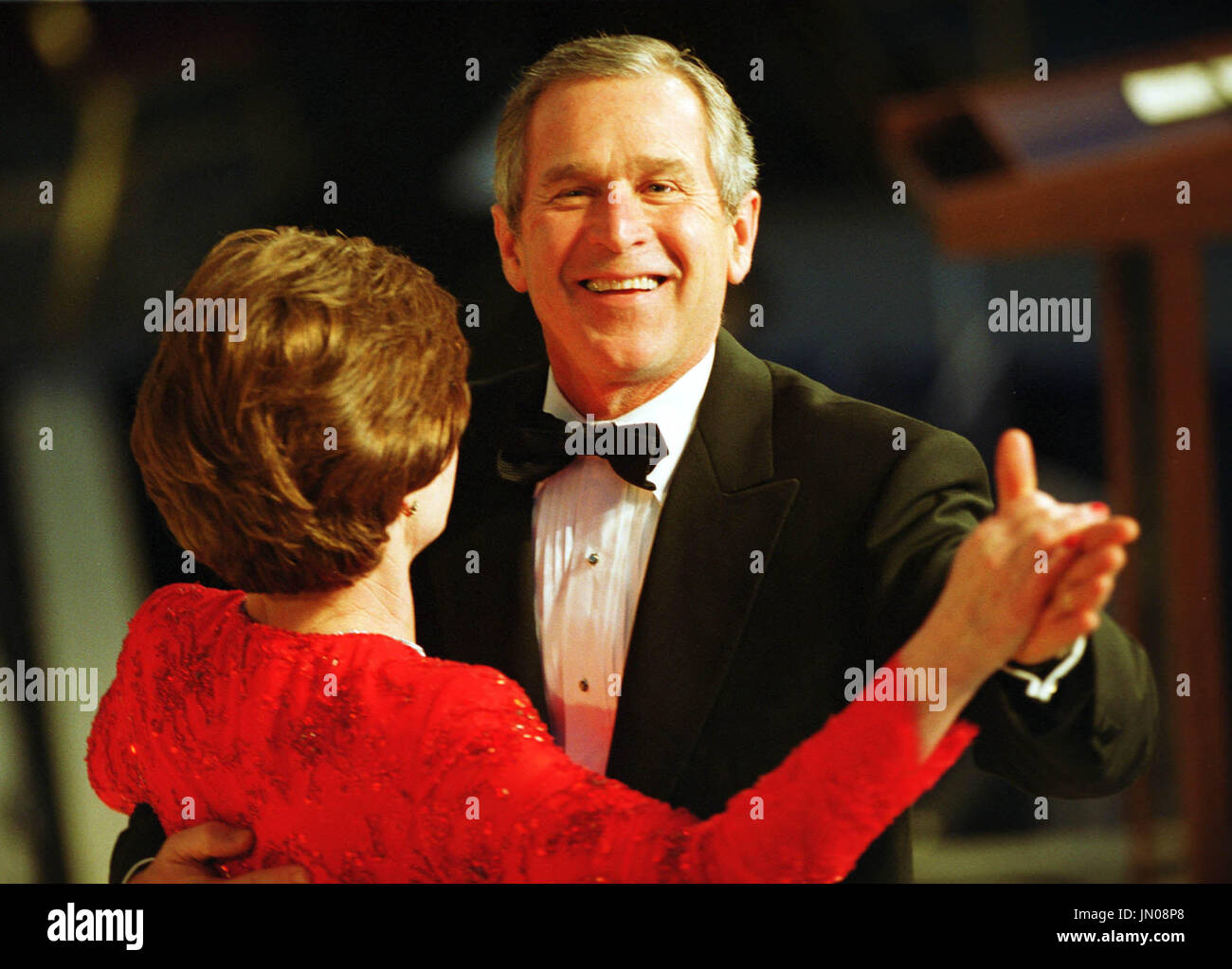 United States President George W. Bush and First Lady Laura Bush dance ...