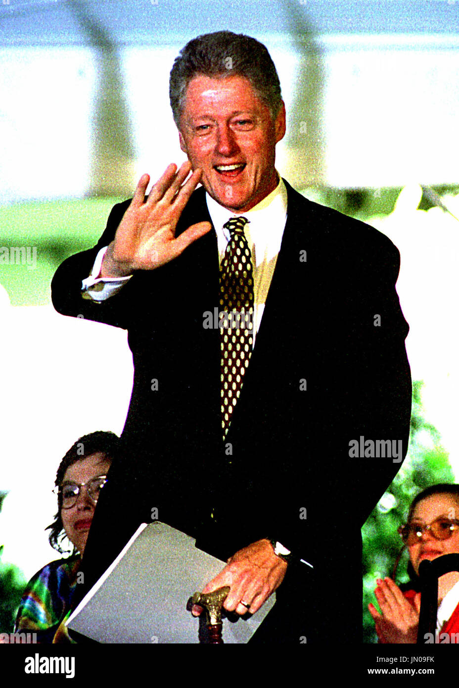 United States President Bill Clinton waves to invited guests as he ...