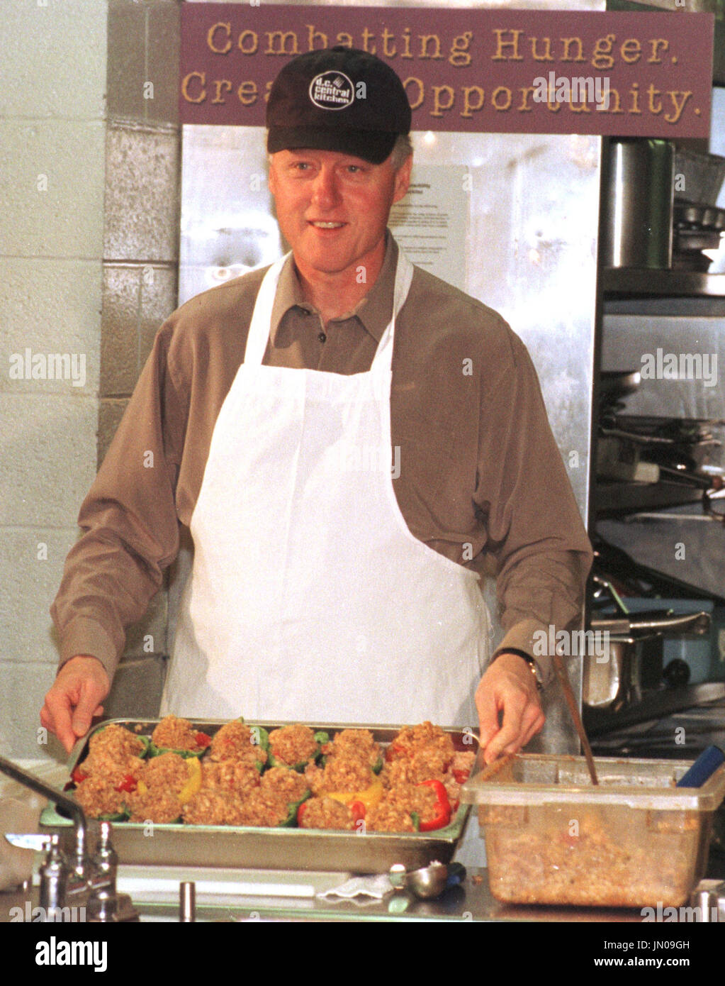 United States President Bill Clinton shows off some of the food he ...