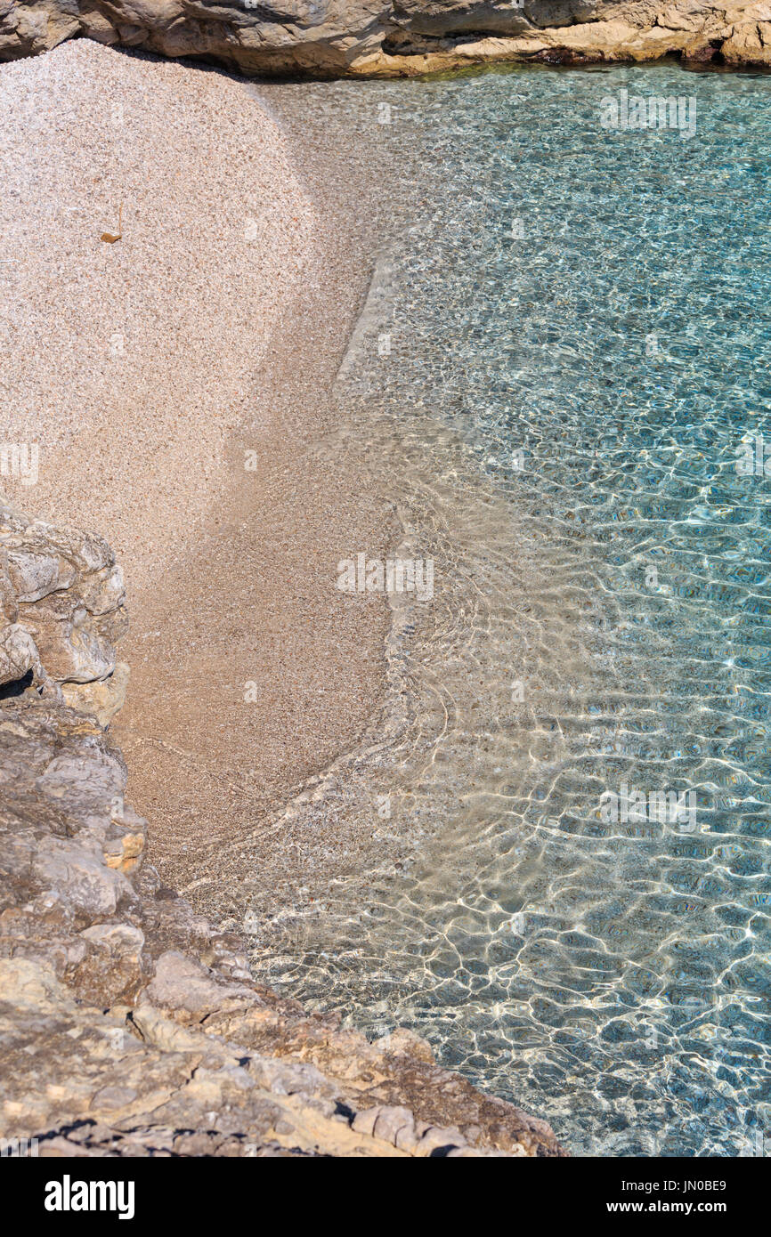 Blue sea ripple flowing water surface with waves on small beach. Nature ...