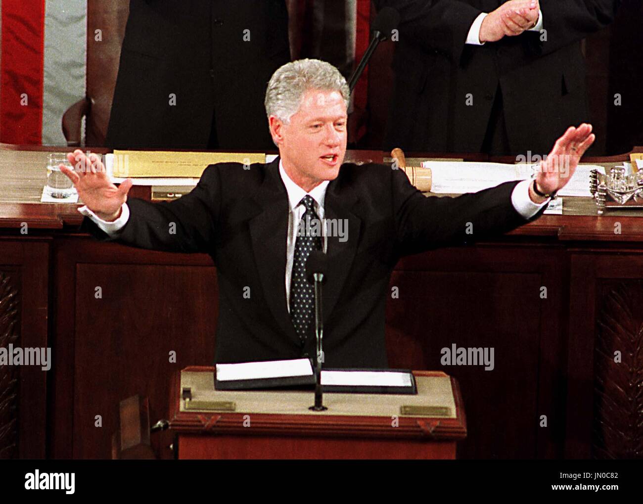 United States President Bill Clinton acknowledges the applause as he ...