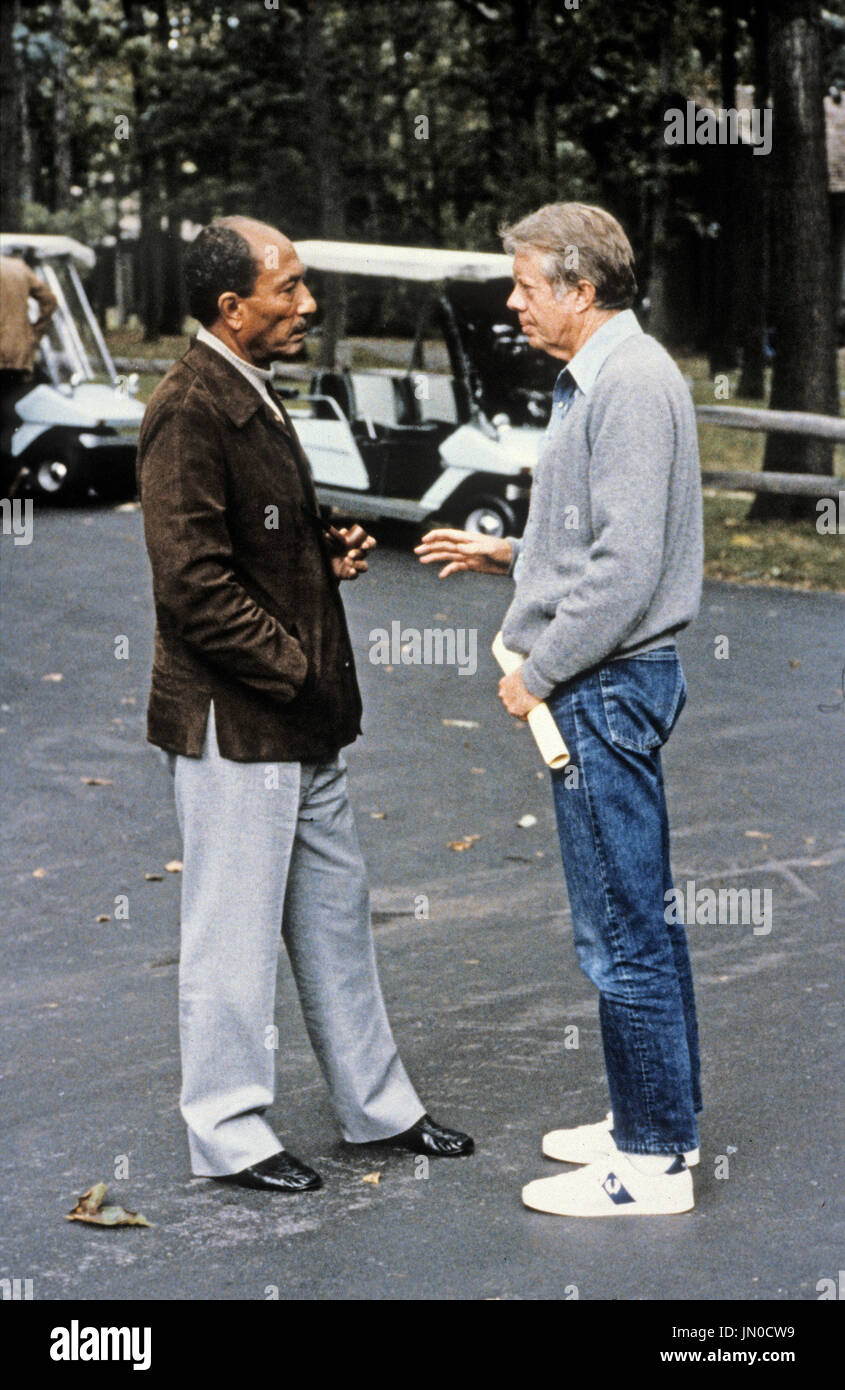 President Anwar al-Sadat of Egypt, left, listens to United States ...
