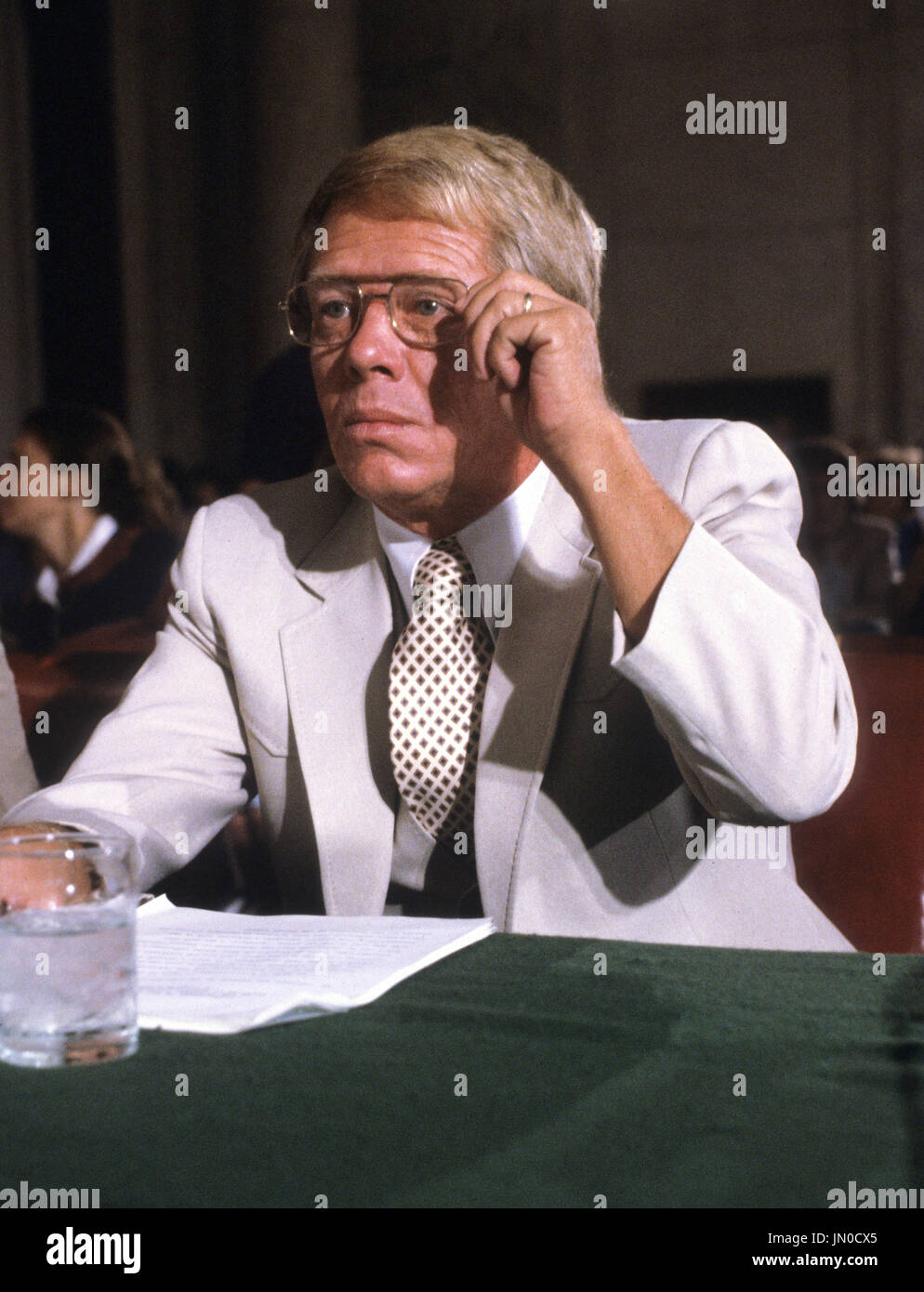 Billy Carter, brother of United States President Jimmy Carter, adjusts ...