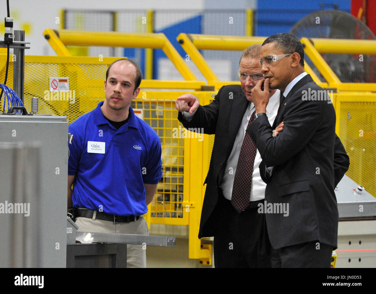 United States President Barack Obama (R) tours Orion Energy Systems ...