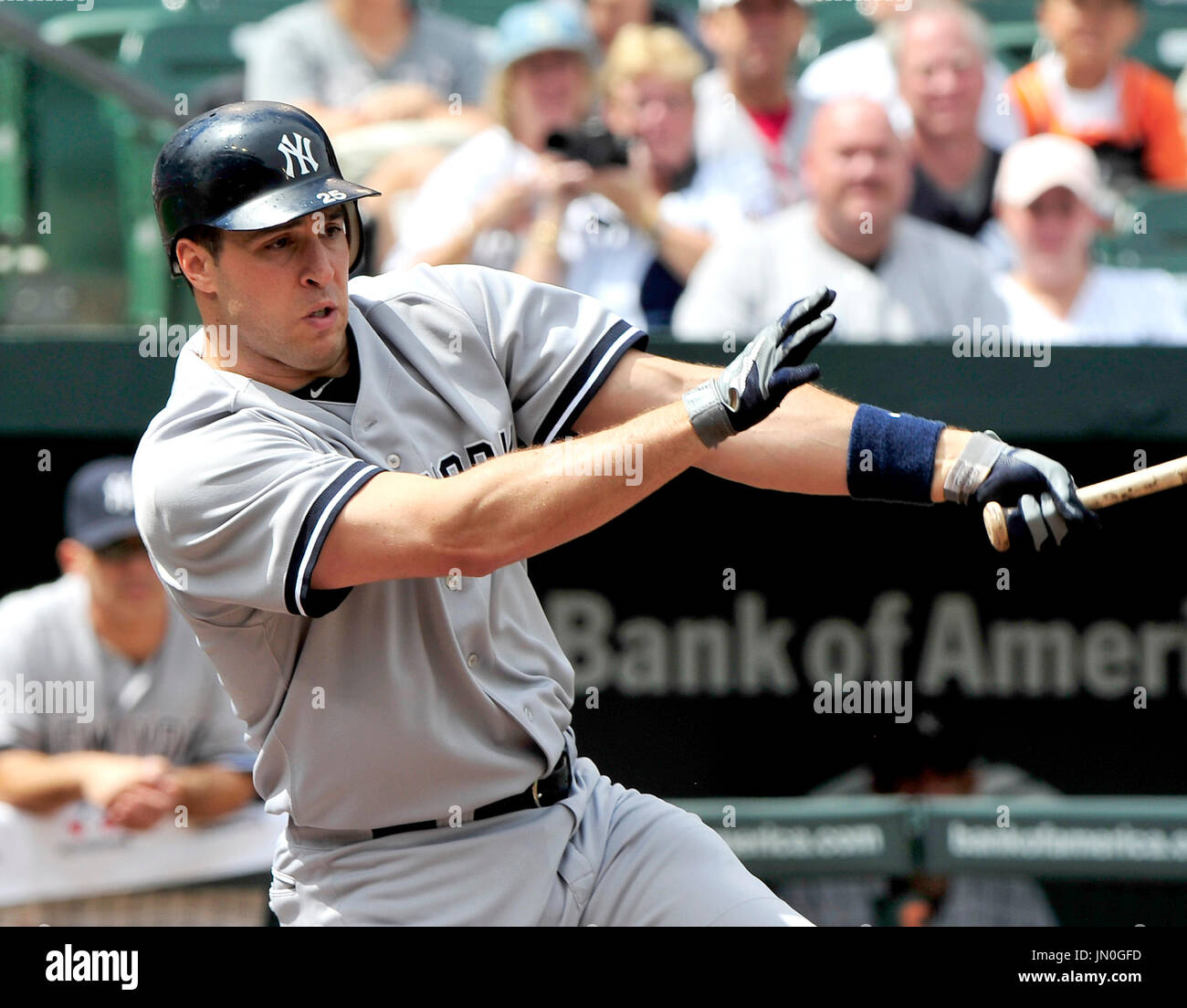 New York Yankees first baseman Mark Teixeira (25) singles in the first ...