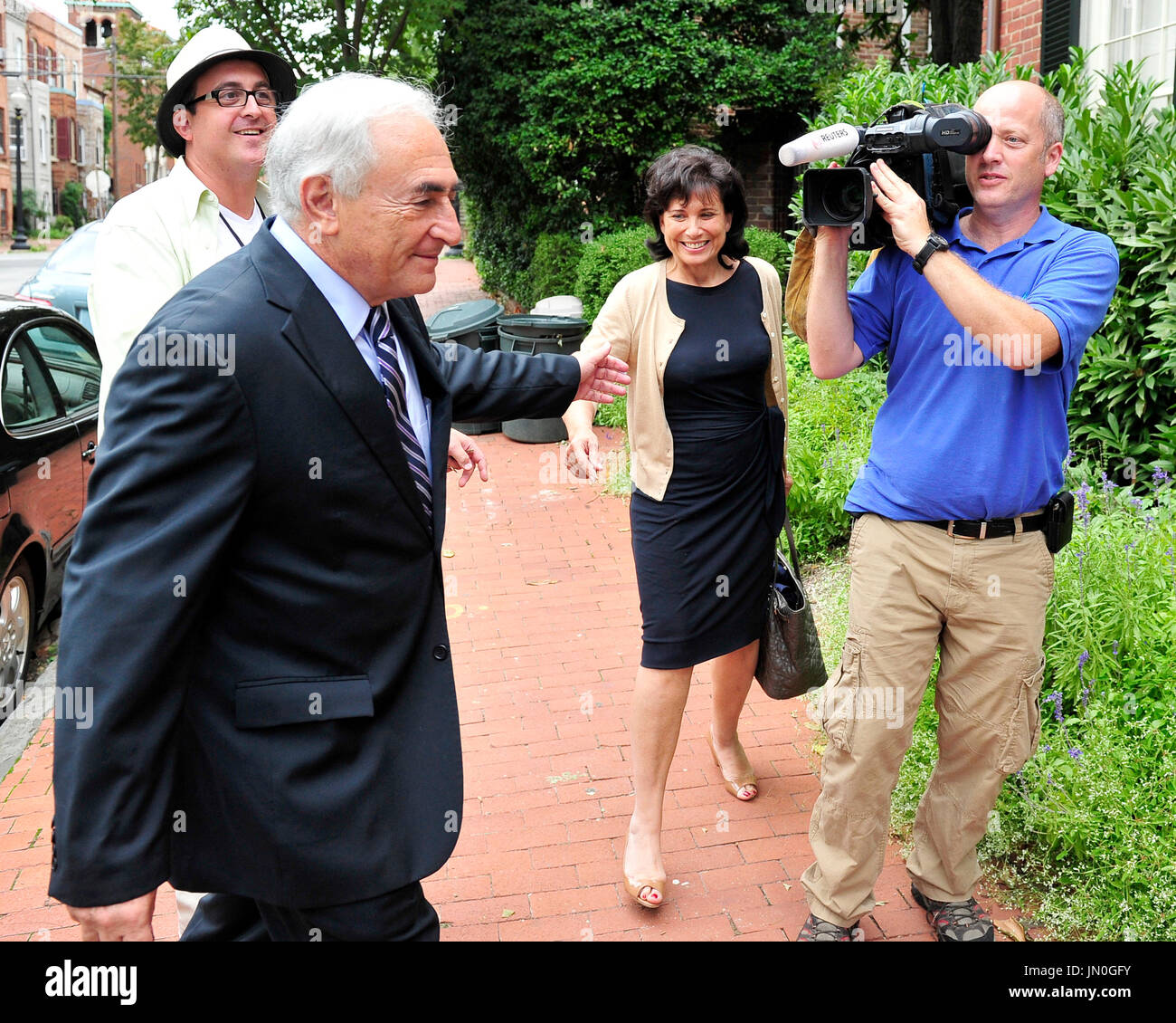 Surrounded by media, Dominique Strauss-Kahn, the former head of the ...