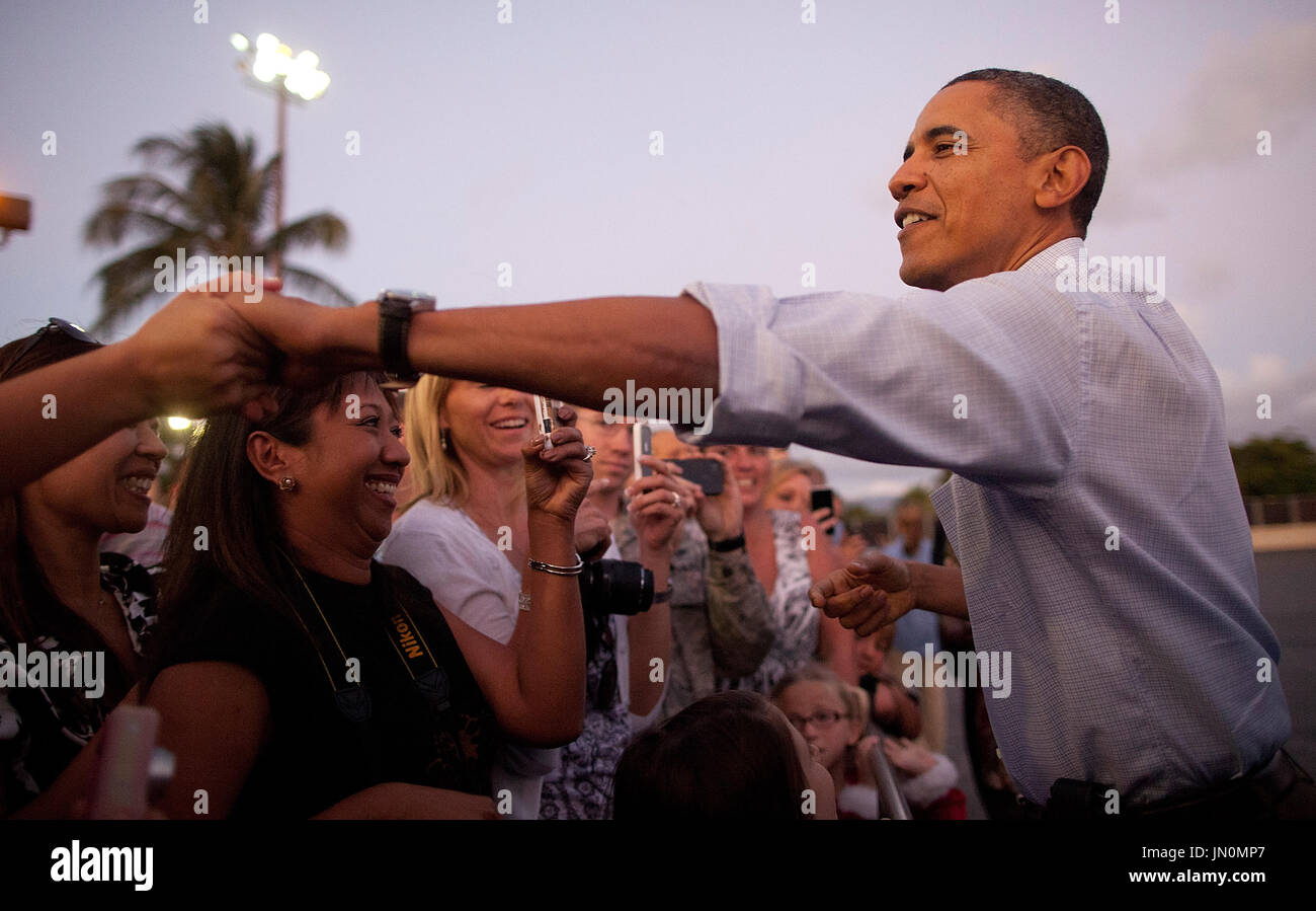 United States President Barack Obama greets well-wishers after arriving ...