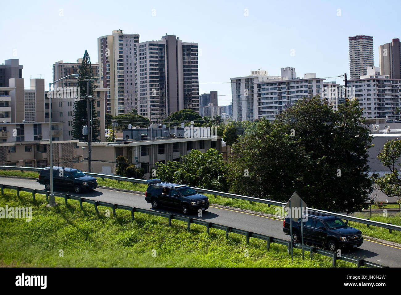 United States President Barack Obama's motorcade is seen along the ...