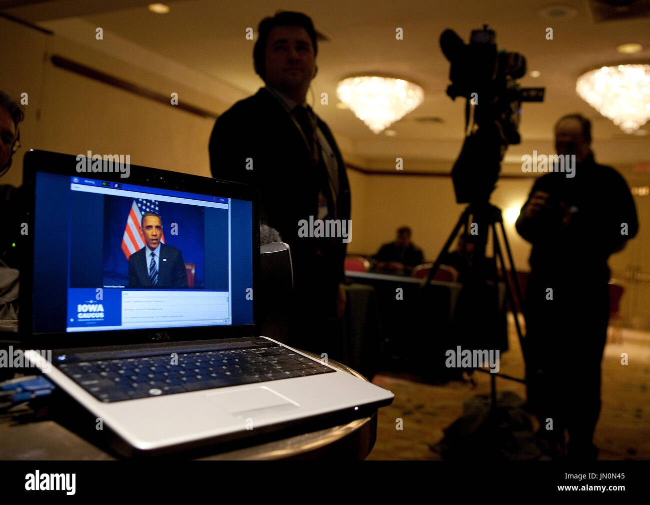 Reporters record United States President Barack Obama who is shown on ...