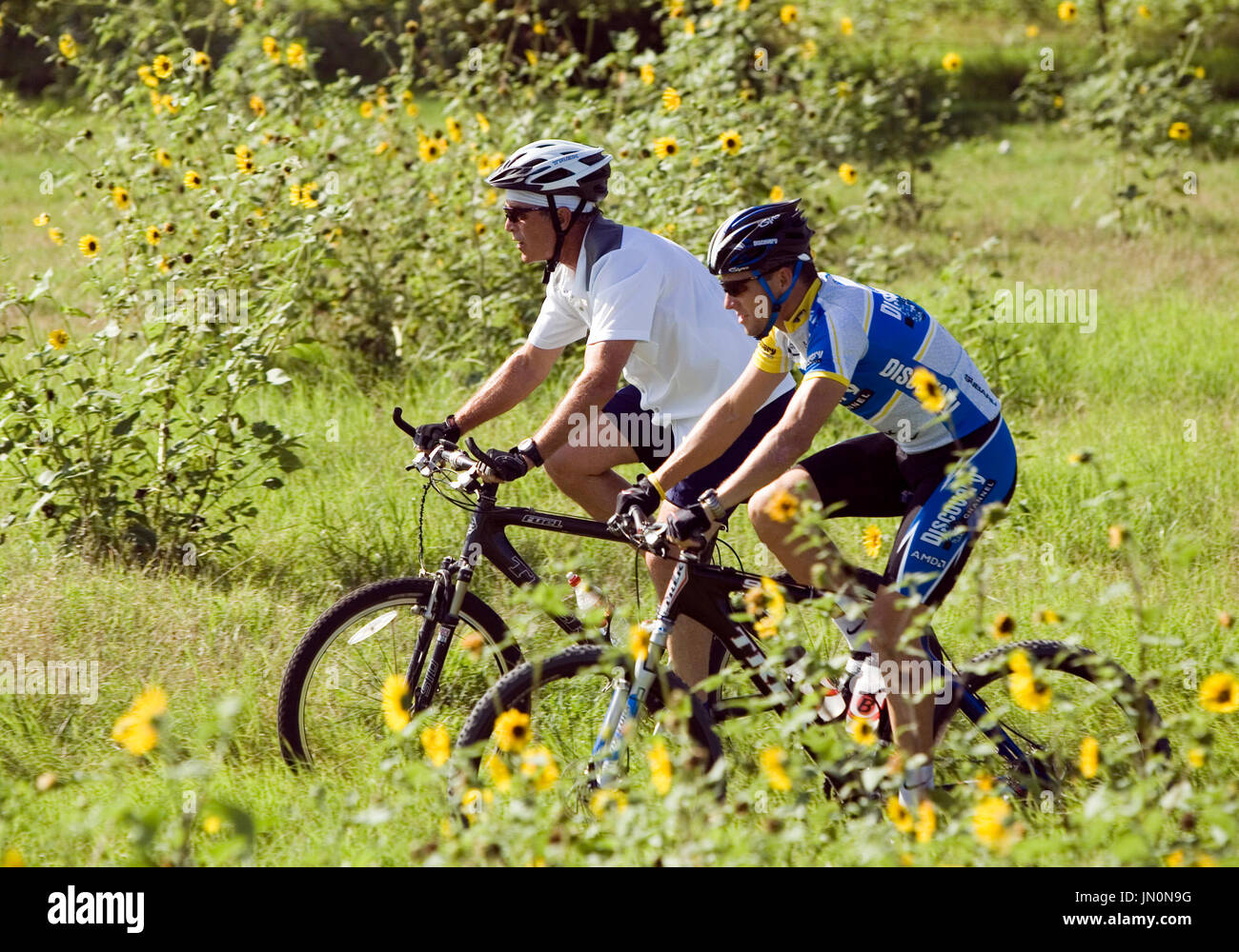 United States President George W. Bush bike ride with Peloton One and ...