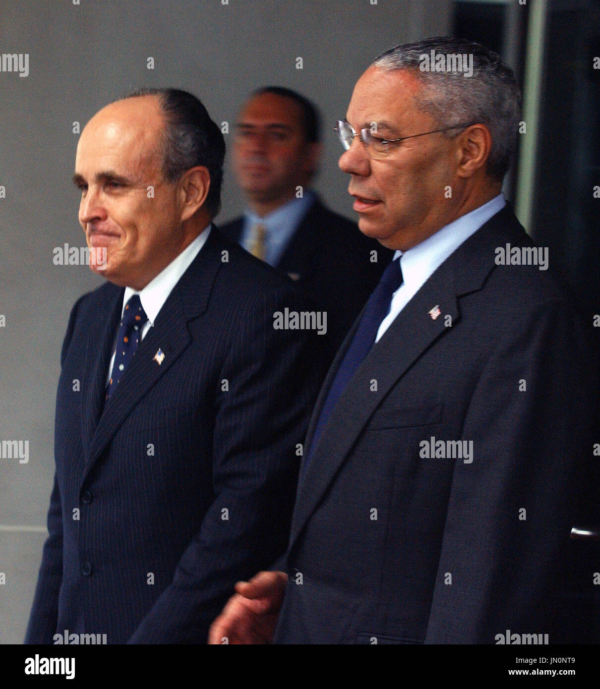 United States Secretary of State Colin Powell, right, and former New ...