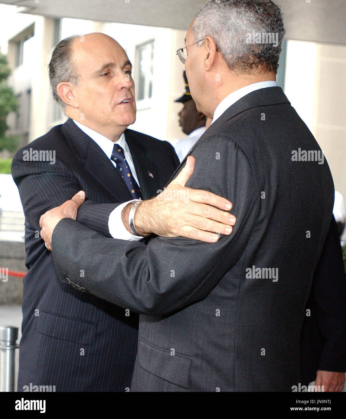 United States Secretary of State Colin Powell, right, and former New ...