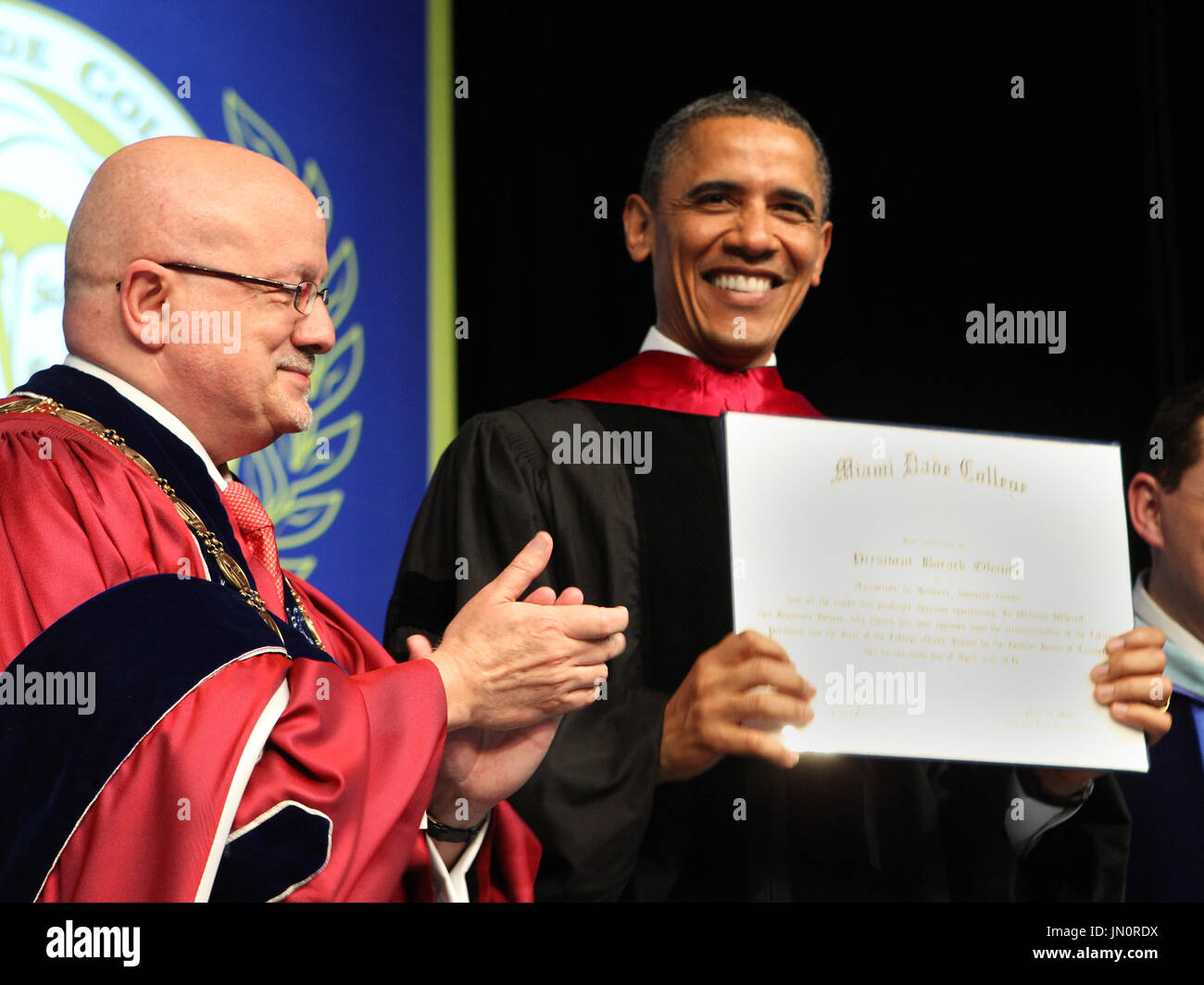 United States President Barack Obama (R) Iis congratulated by Dr. Jose ...