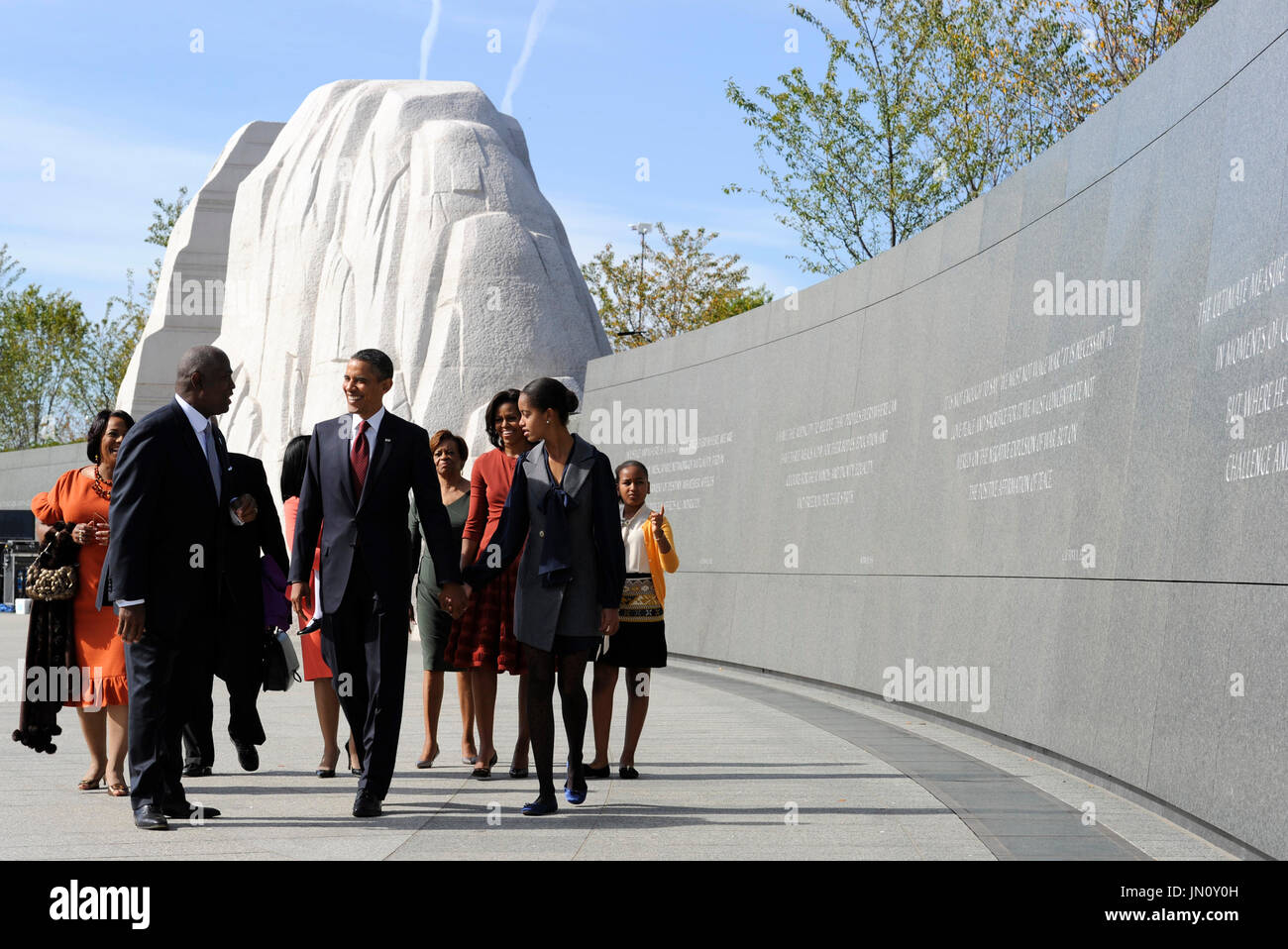 United States President Barack Obama listens to Harry Johnson ...