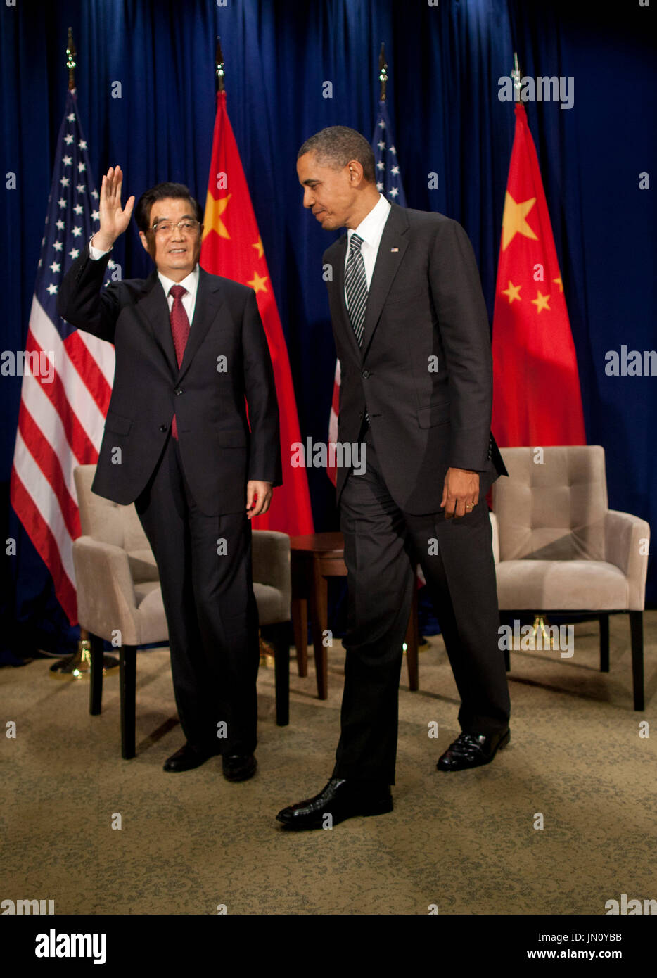 President Hu Jintao of China, left, waves as he and United States ...