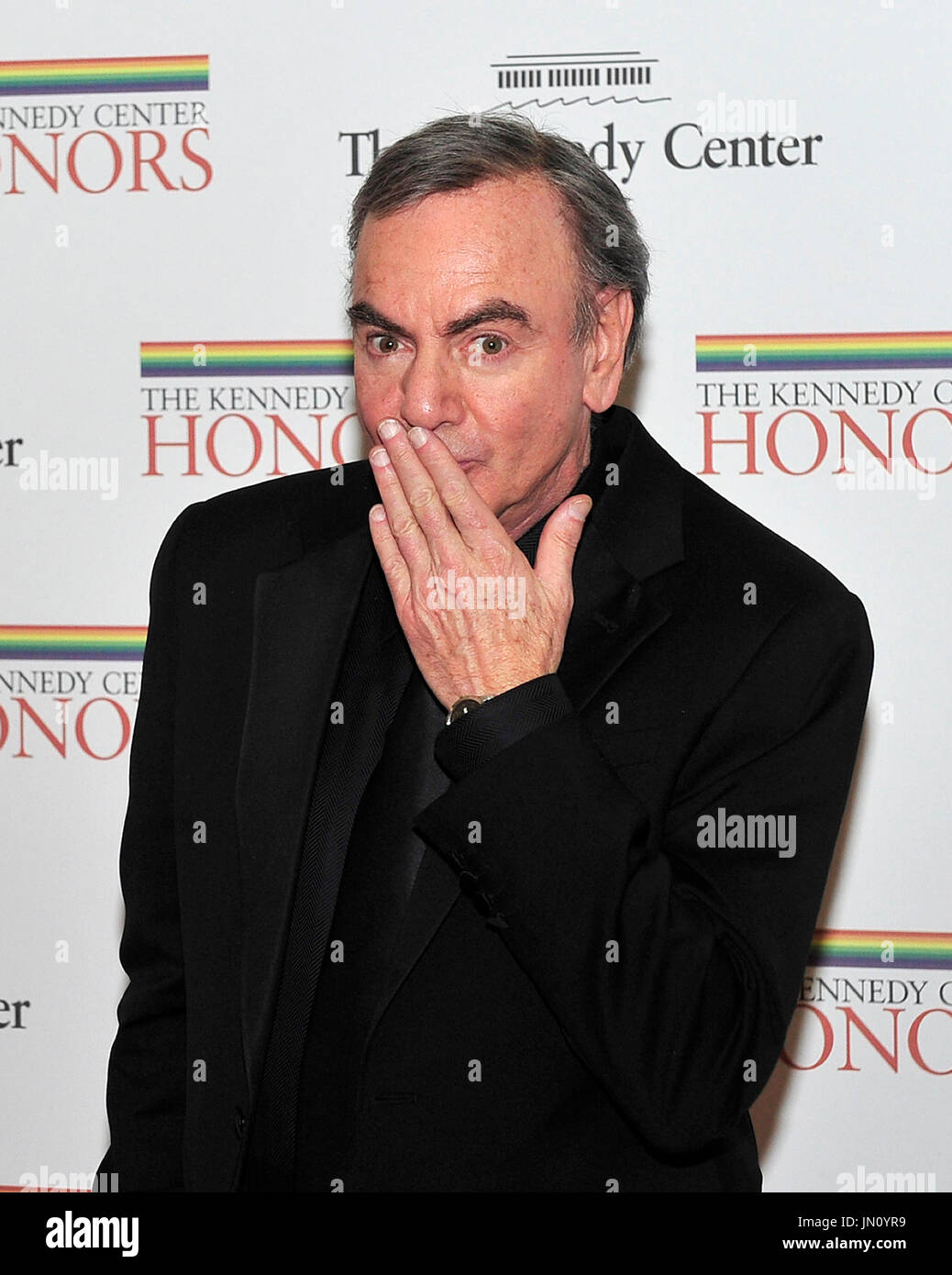 Neil Diamond blows a kiss to the photographers as he arrives for the ...