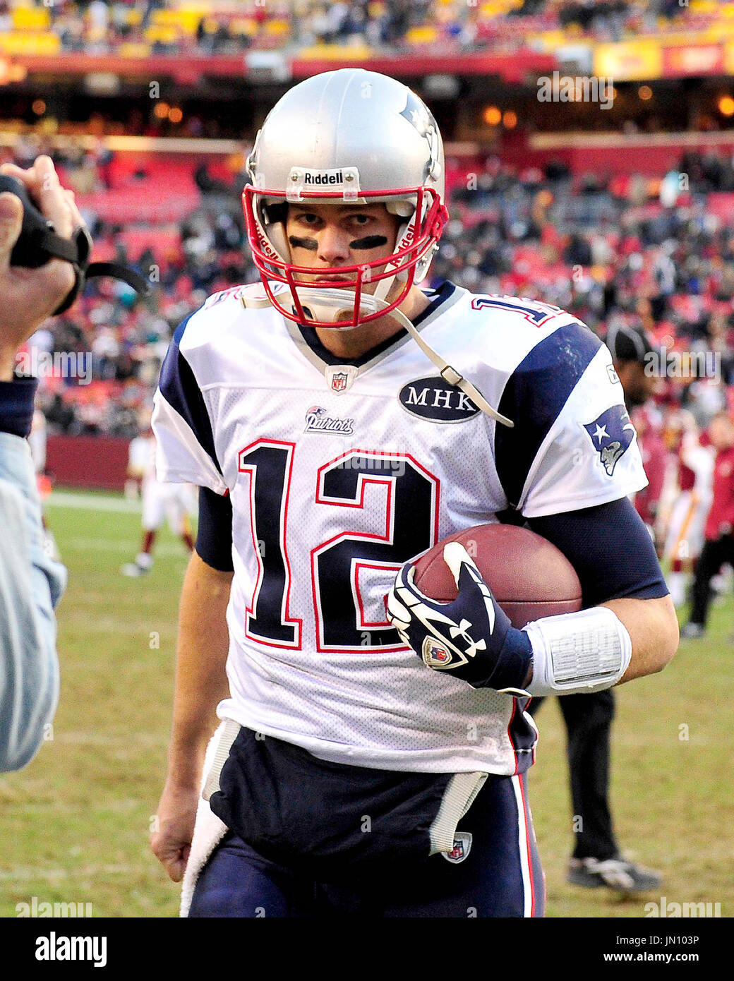New England Patriots quarterback Tom Brady (12) leaves the field ...