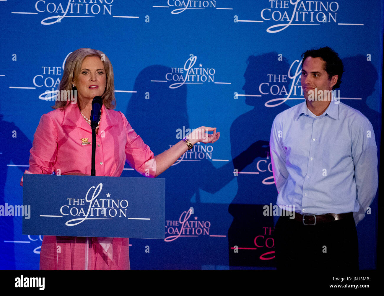 Ann Romney, left, thanks her youngest son, Craig, right, for his ...