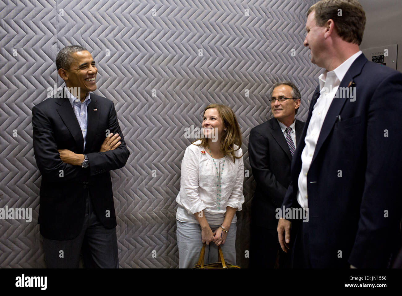 President Barack Obama rides the elevator with Alyssa Mastromonaco ...