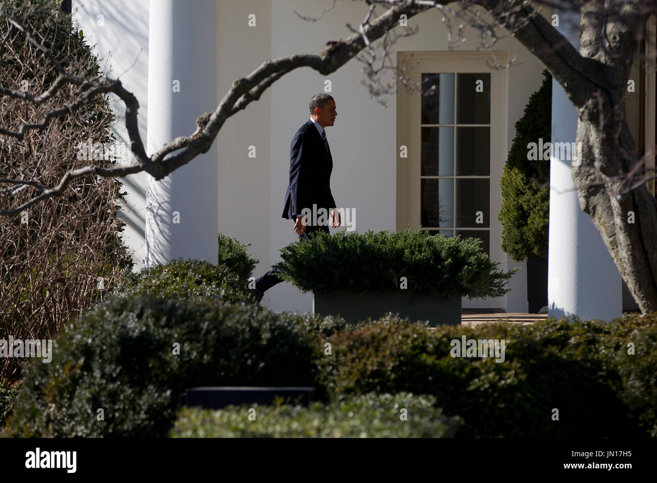 United States President Barack Obama walks towards the Oval Office ...