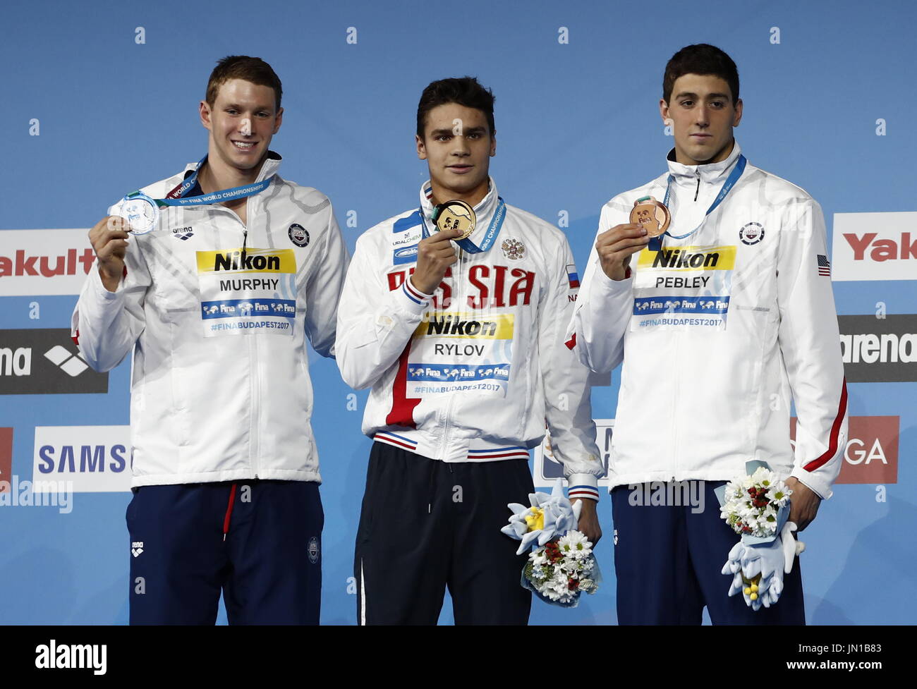 Budapest, Ryan Murphy (L) and bronze medalist Jacob Pebley of the USA ...