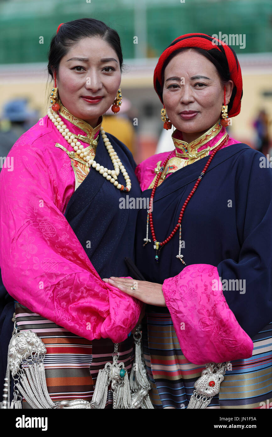 Daofu, China's Sichuan Province. 29th July, 2017. Brightly costumed ...