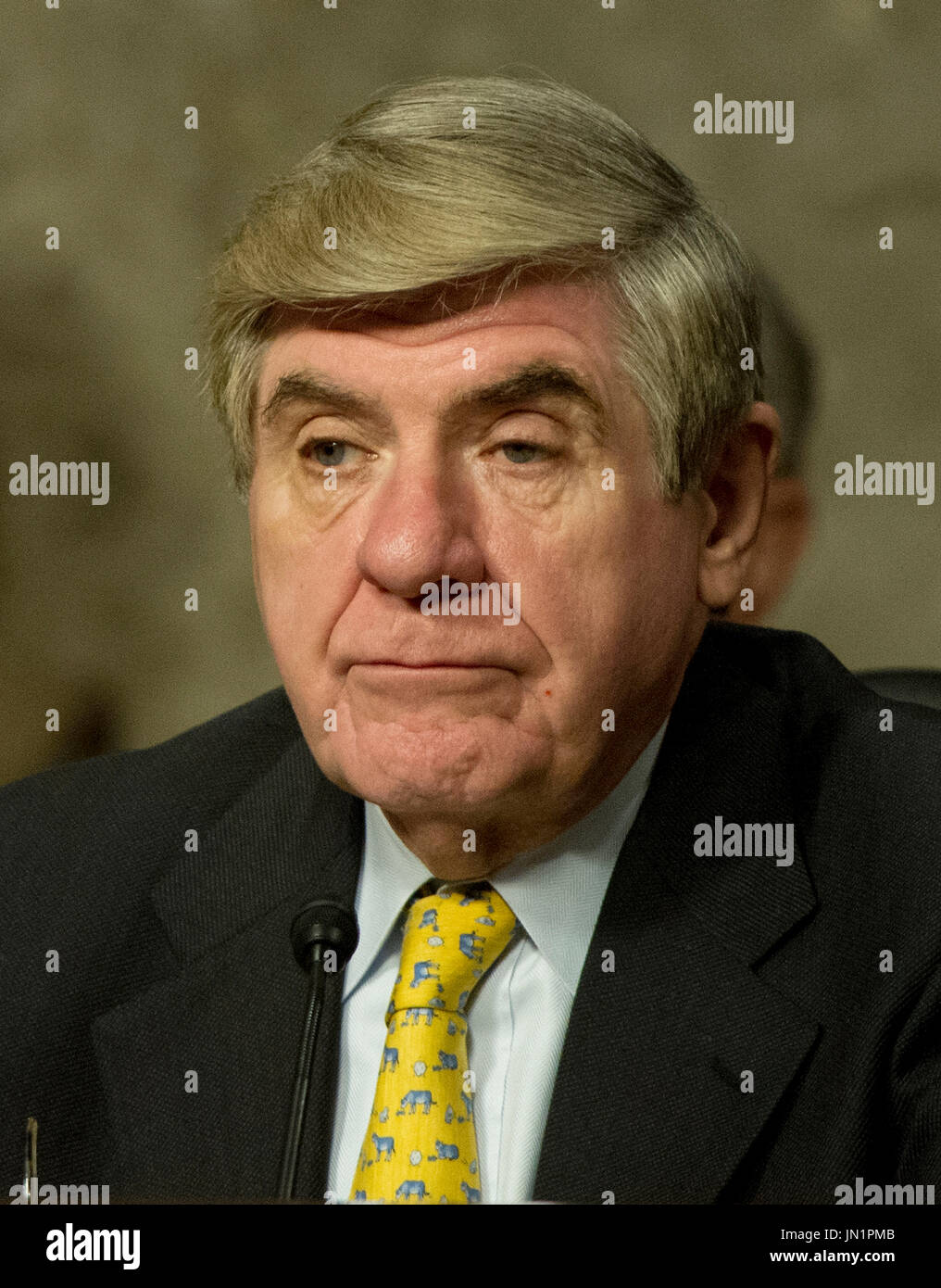 United States Senator Ben Nelson (Democrat of Nebraska), listens as ...