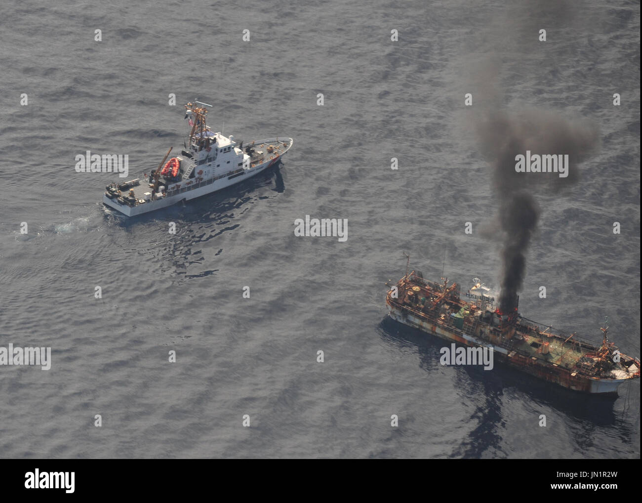 The Coast Guard Cutter Anacapa crew monitors the Japanese vessel, Ryou ...