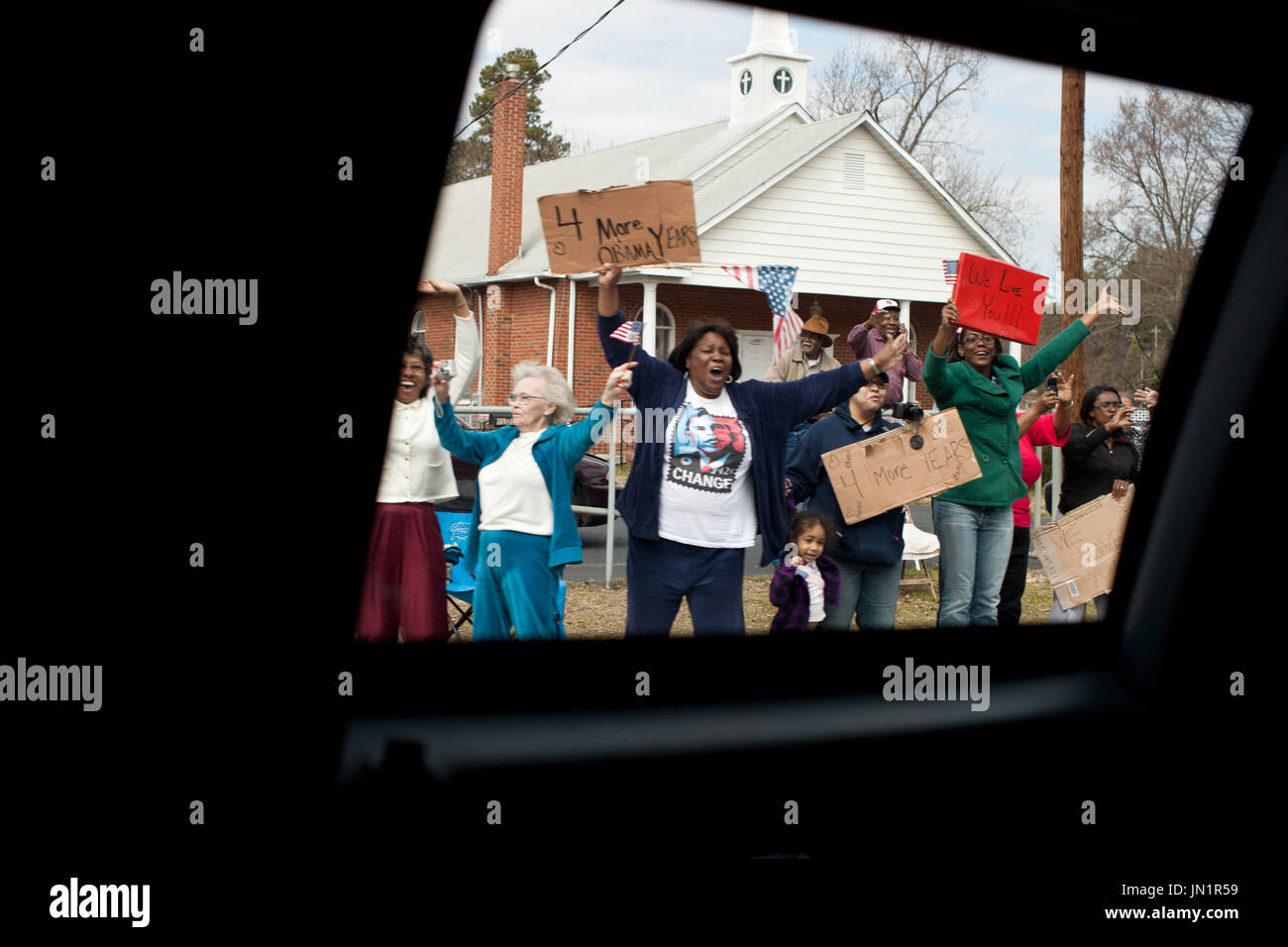People line the motorcade route as United States President Barack Obama ...