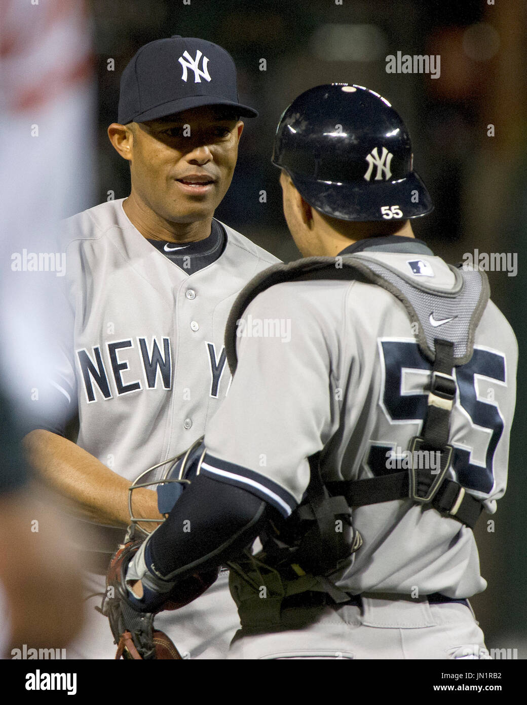 New York Yankees pitcher Mariano Rivera (42), left and catcher Russell ...