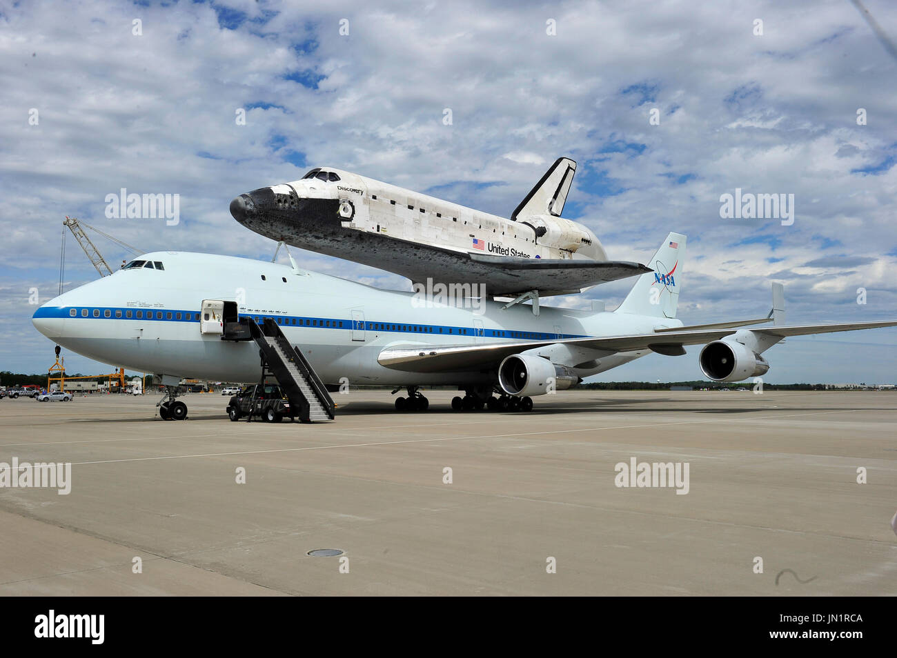 Space Shuttle Discovery sits atop its transport plane at Washington ...