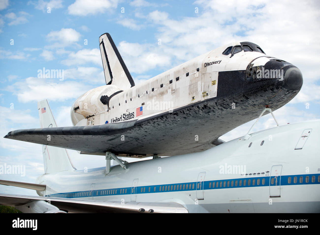 Space Shuttle Discovery sits atop its transport plane at Washington ...