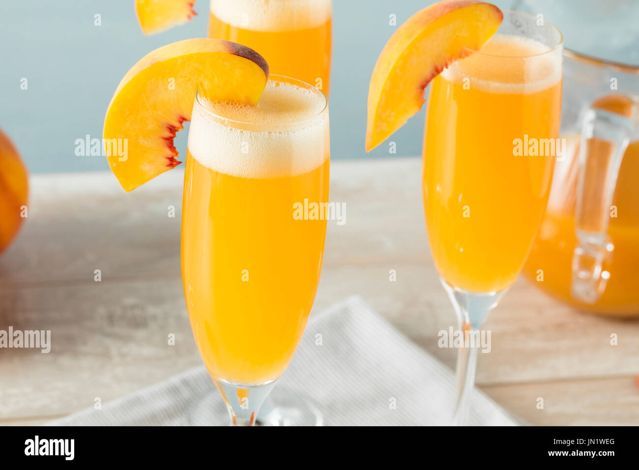 Sweet Bubbly Peach Bellini Mimosa with Champagne Stock Photo - Alamy