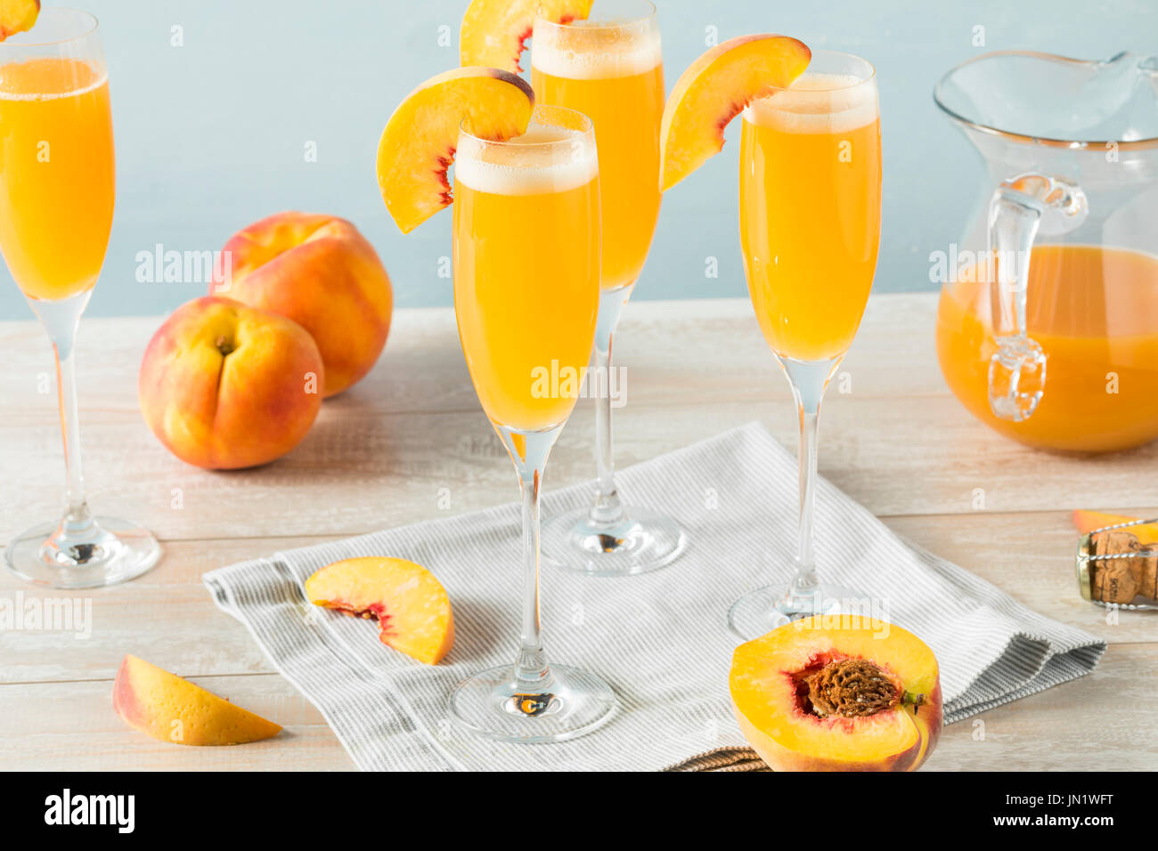 Sweet Bubbly Peach Bellini Mimosa with Champagne Stock Photo - Alamy