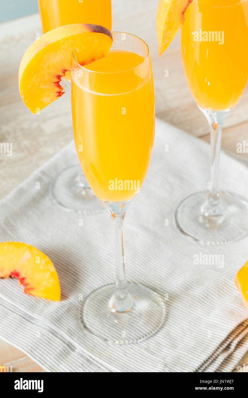 Sweet Bubbly Peach Bellini Mimosa with Champagne Stock Photo - Alamy