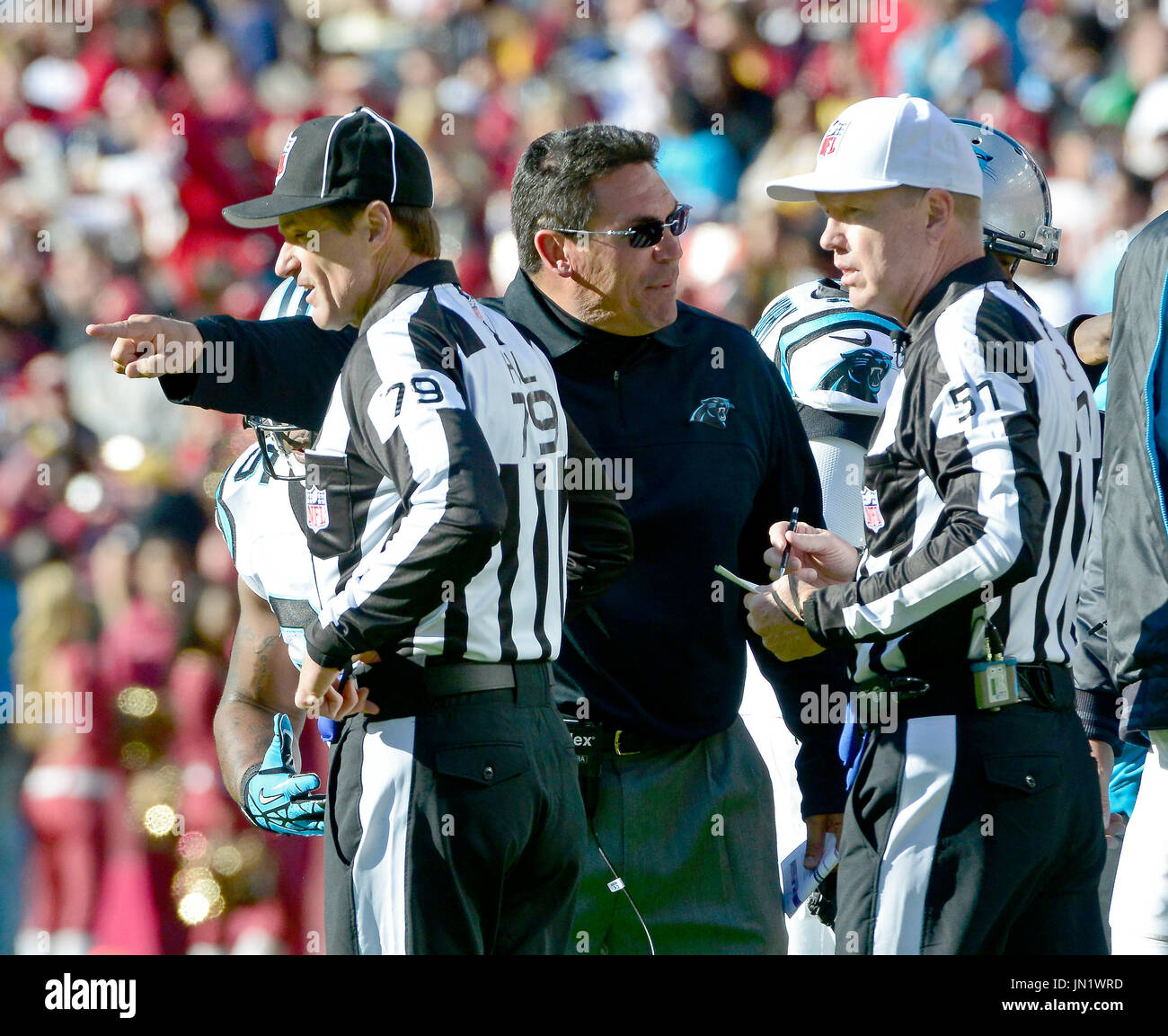 Carolina Panthers head coach Ron Rivera has a discussion with head ...