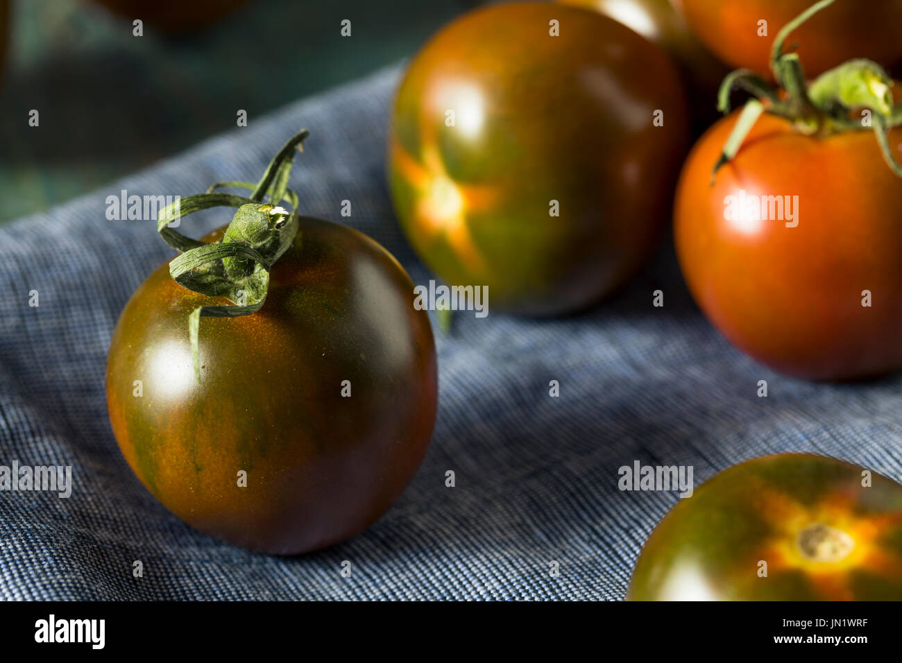 Raw Organic Brown Kumato Tomatoes Ready to Eat Stock Photo - Alamy