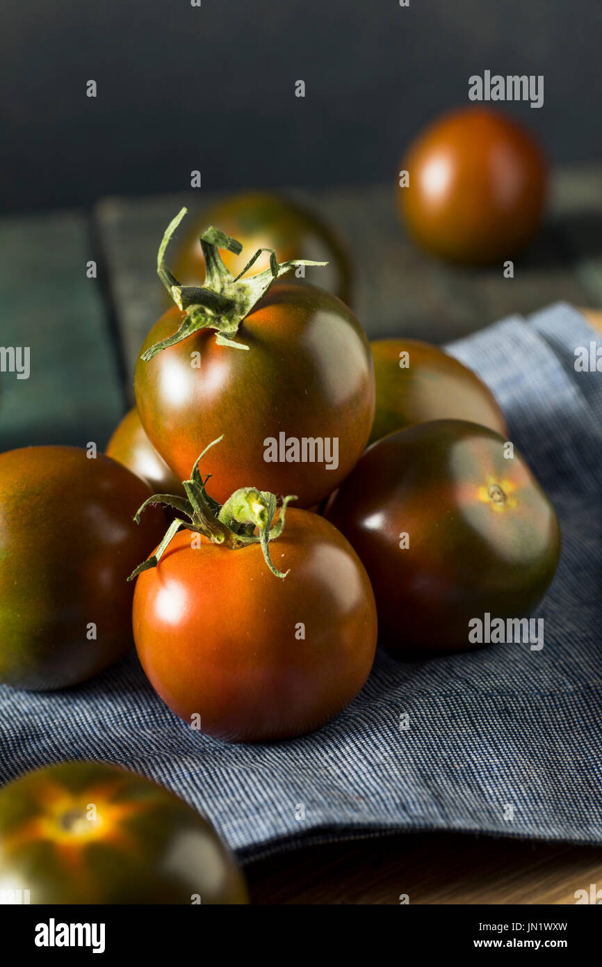 Raw Organic Brown Kumato Tomatoes Ready to Eat Stock Photo - Alamy