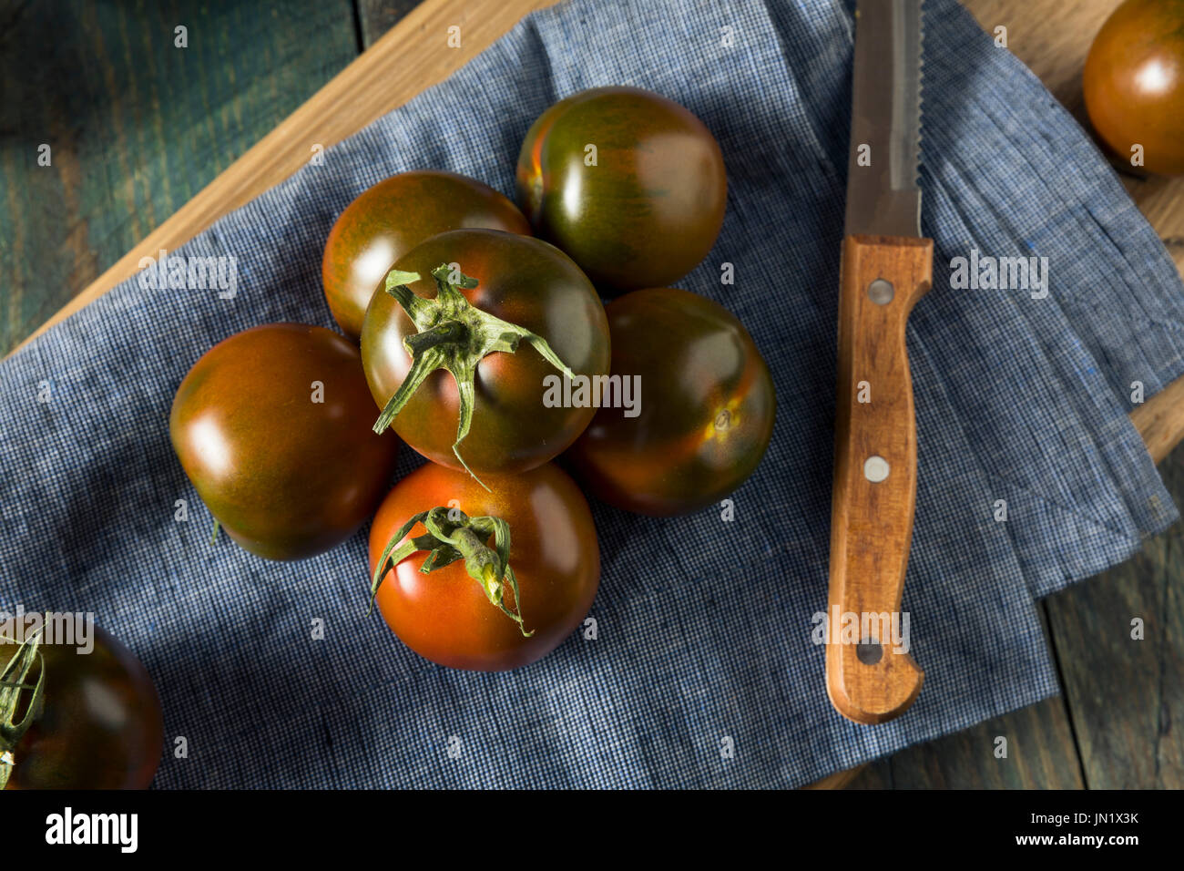 Raw Organic Brown Kumato Tomatoes Ready to Eat Stock Photo - Alamy