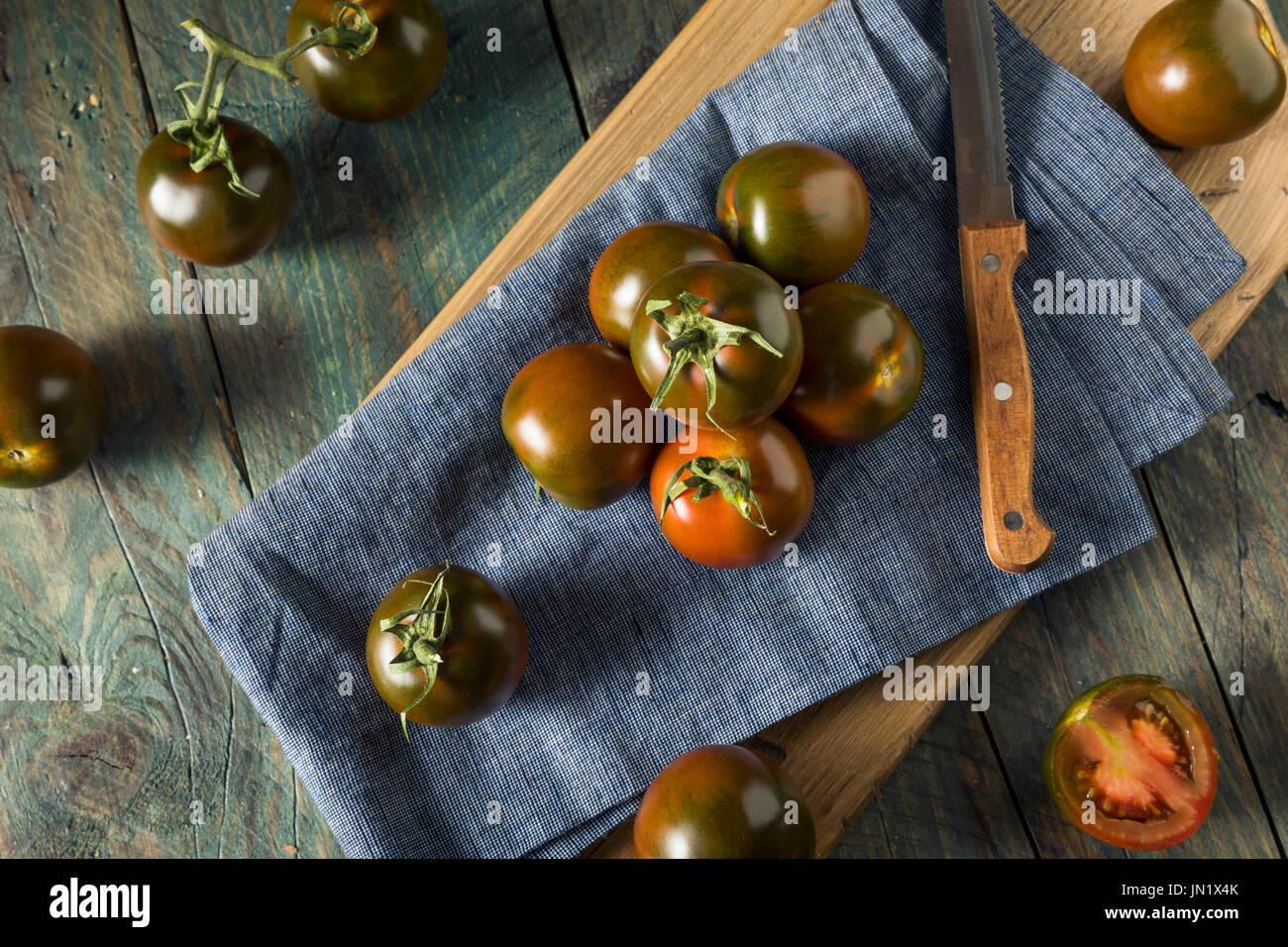 Raw Organic Brown Kumato Tomatoes Ready to Eat Stock Photo - Alamy
