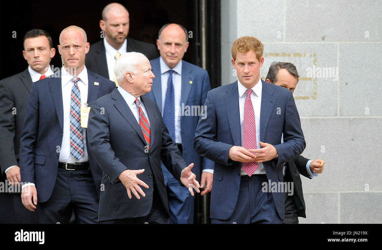 U.S. Sen. John McCain (R-AZ) (L) and HRH Prince Harry leave Russell ...