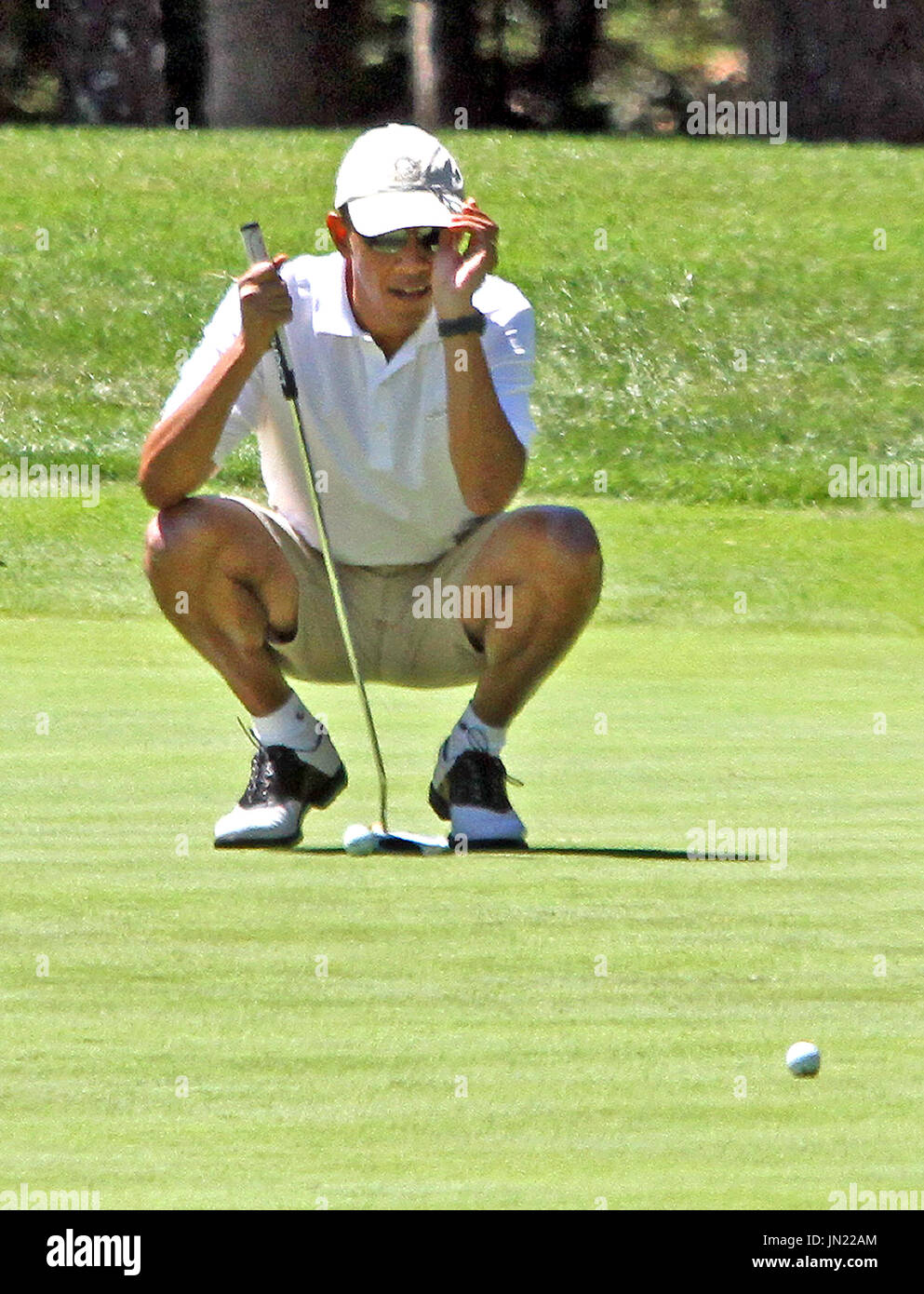 United States President Obama three-putted the first hole on Farm Neck ...