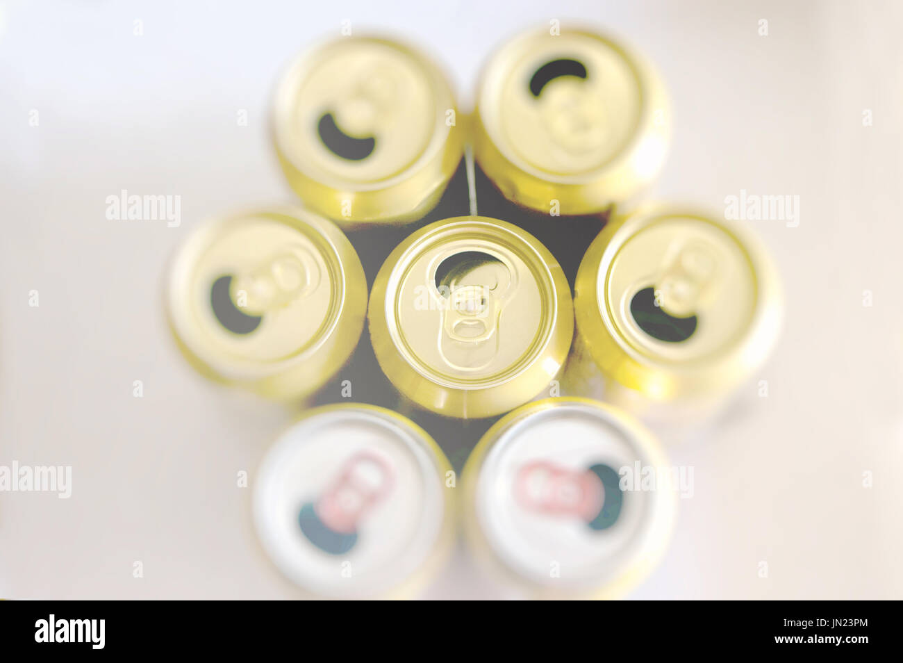 Top view of opened golden beer cans Stock Photo - Alamy