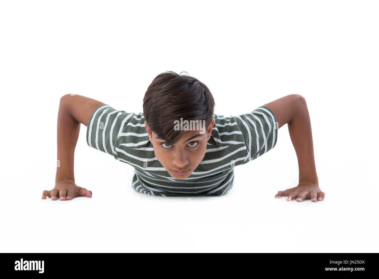Confident teenage boy performing push ups Stock Photo - Alamy