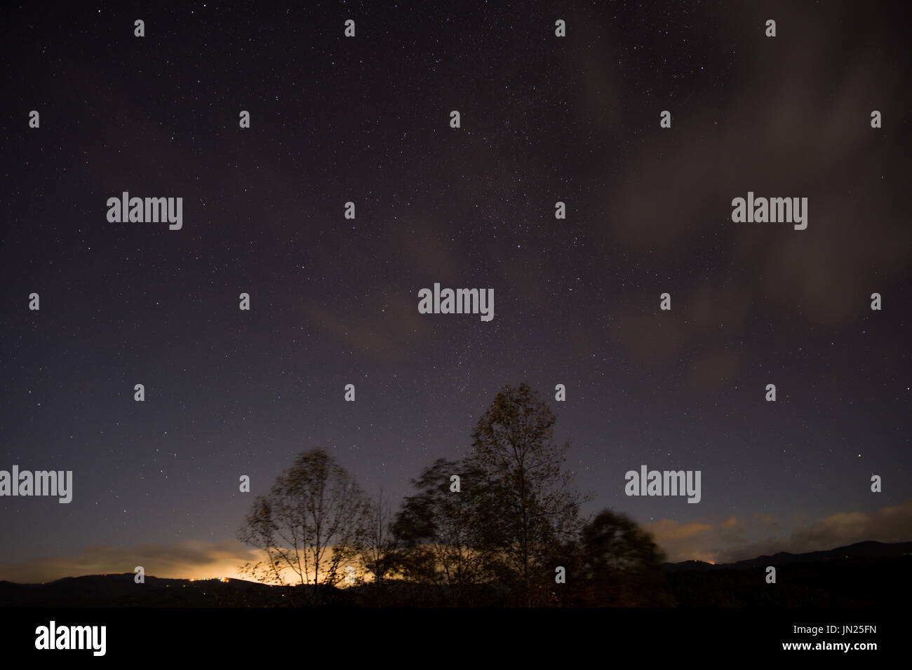 Cloudy night stars hi-res stock photography and images - Alamy