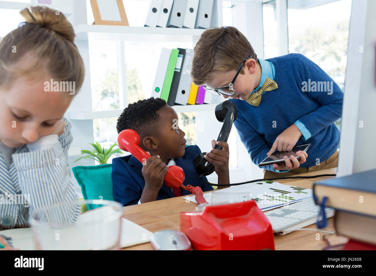 Cute girl in office talking hi-res stock photography and images - Alamy